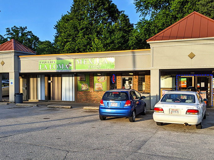 The unassuming exterior of Taqueria La Loma might not scream "culinary destination," but that green sign is basically a beacon for tamale lovers across Ohio.