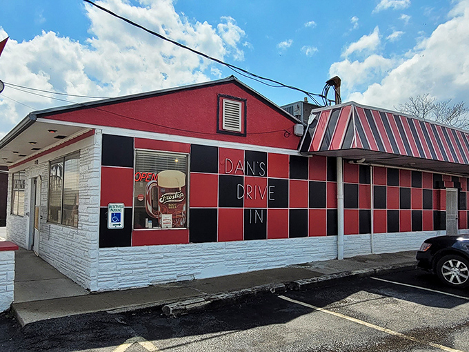 The red and white checkered exterior of Tio's Diner stands as a time capsule of Americana, beckoning hungry travelers with nostalgic charm.