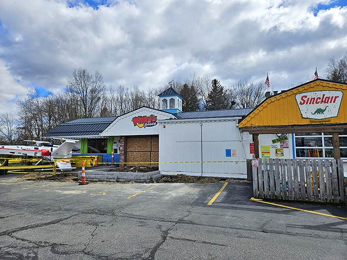 The exterior of Mike's Place looks like what would happen if a diner, a gas station, and an airplane hangar decided to start a family. Complete with its own X-wing fighter!