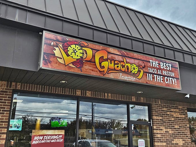 The unassuming storefront promises "THE BEST TACO AL PASTOR IN THE CITY!" &mdash; a bold claim that Los Guachos actually manages to back up.