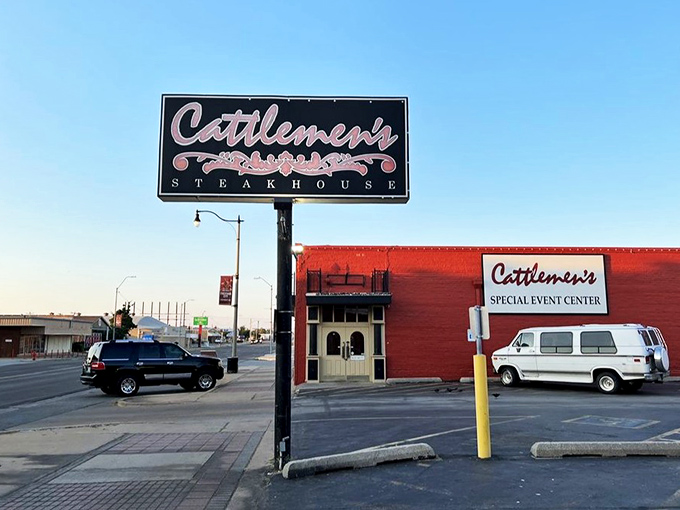 The iconic neon sign beckons hungry travelers like a carnivorous lighthouse in Oklahoma City's Stockyards. Some landmarks need no fancy frills.