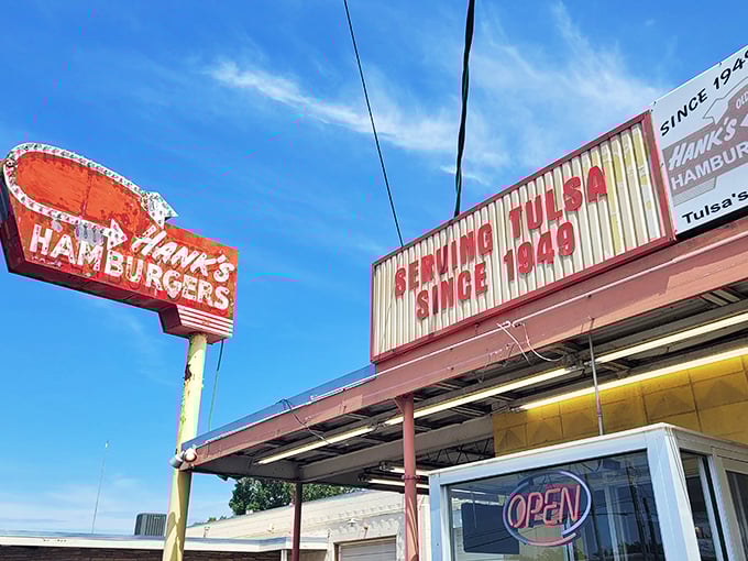 The neon promise of burger paradise! Hank's iconic sign has been guiding hungry Tulsans to burger bliss since the days when Elvis was still topping the charts.