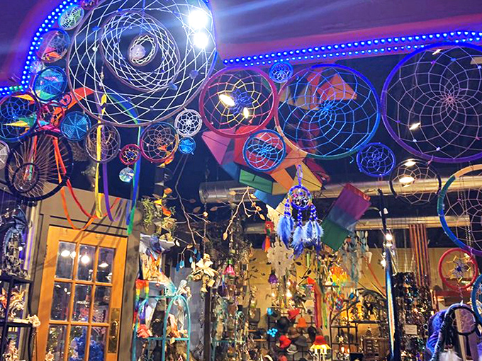 Dreamcatcher heaven! The ceiling at Craig's looks like what happens when a cosmic spider decides to redecorate with neon and good vibes.
