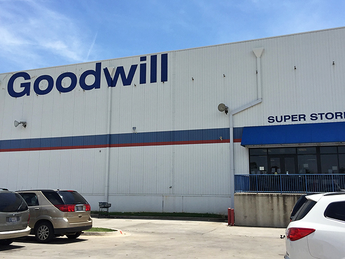 The unassuming exterior hides a treasure hunter's paradise within. Like finding a secret speakeasy, but instead of cocktails, you'll discover vintage cardigans and forgotten vinyl.