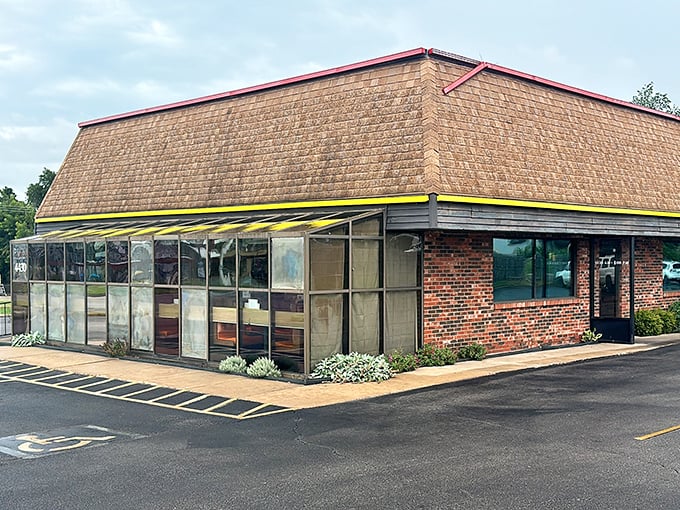 The unassuming brick exterior of Chuck House might not scream "culinary destination," but that yellow-trimmed roof has sheltered decades of delicious memories.