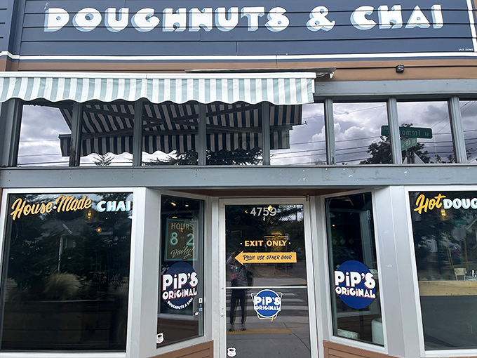 The modest blue-striped awning and understated storefront of Pip's Original might fool you, but locals know better than to judge this donut destination by its cover. 