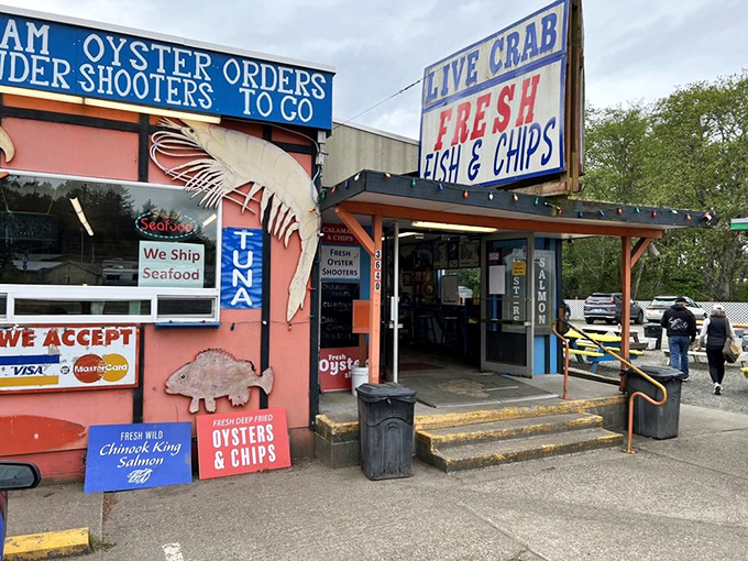 The colorful exterior beckons seafood lovers like a lighthouse calls to ships. Those vibrant picnic tables aren't just furniture&mdash;they're stages for impending seafood euphoria. 