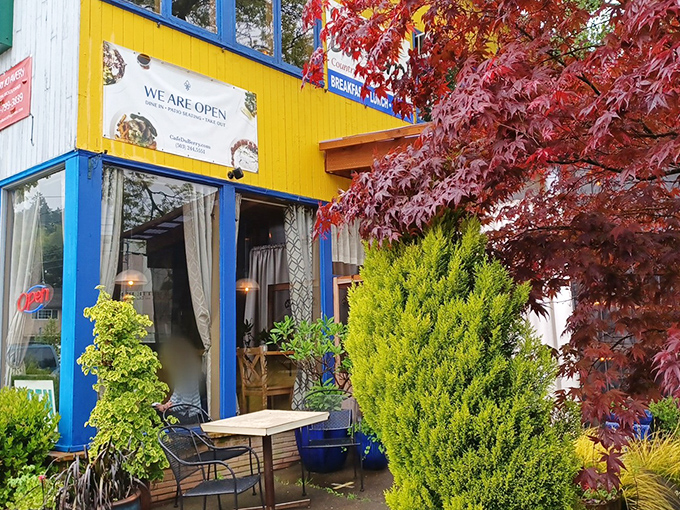 The unassuming exterior of Cafe Du Berry shares space with Tyrrell's, proving once again that culinary treasures often hide in plain sight. 