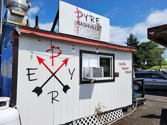 The unassuming white shack with its bold red logo promises a flavor explosion that belies its humble exterior. Southern heat meets Pacific Northwest charm. 