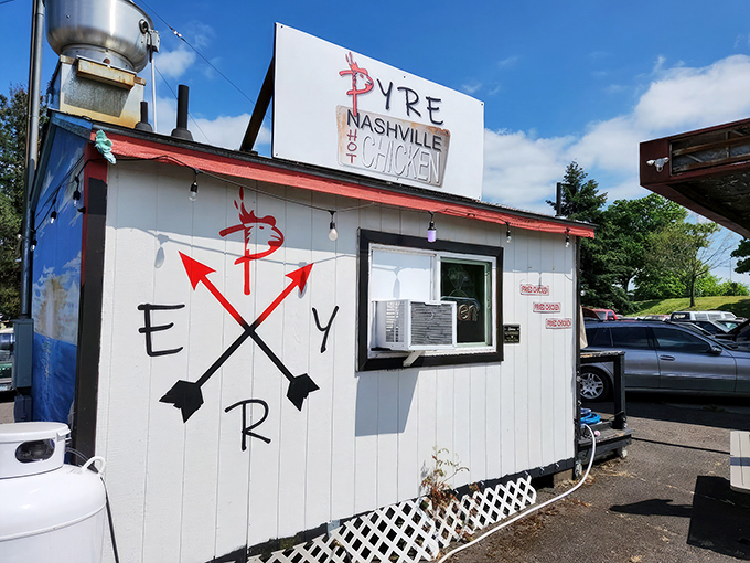 The unassuming exterior of Pyre Nashville Hot Chicken proves once again that culinary treasures often hide in the most modest packages.