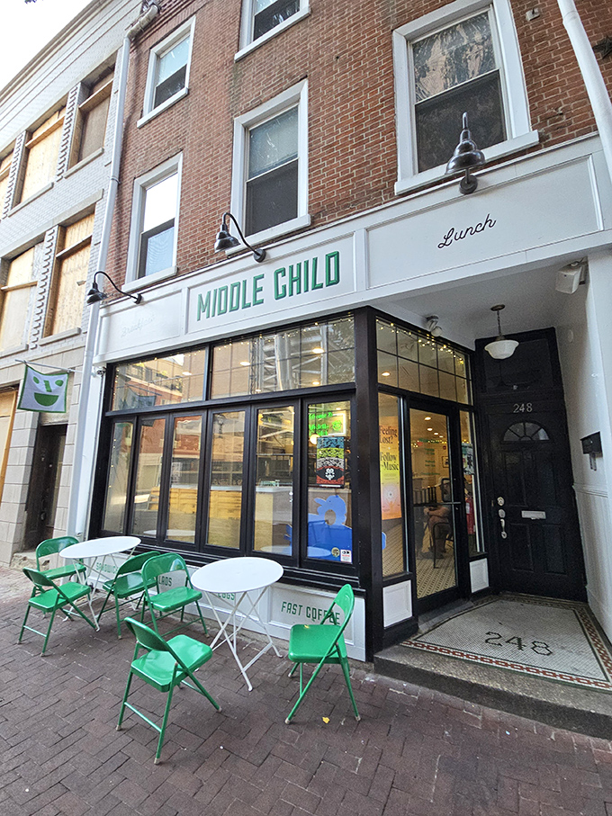 Middle Child's crisp white storefront with vibrant green signage stands like a beacon for sandwich pilgrims on Philadelphia's 11th Street.