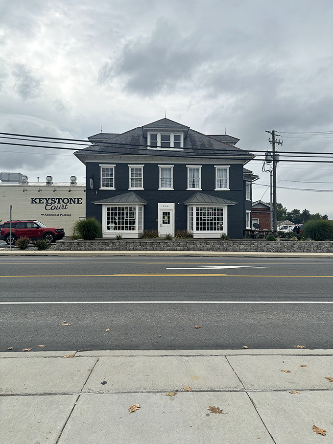 The charcoal-gray exterior of Gracie's stands like a beacon of breakfast hope in Leola's countryside, promising delicious secrets within its walls
