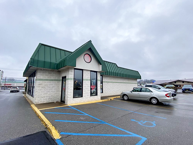 The green-roofed sanctuary of sweetness stands like a beacon of hope for sugar enthusiasts everywhere. Warning: Extremely Addictive is less a slogan, more a public service announcement.