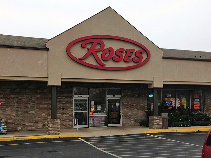 The iconic red Roses sign beckons bargain hunters like a retail lighthouse guiding ships to shore. Treasure awaits inside!