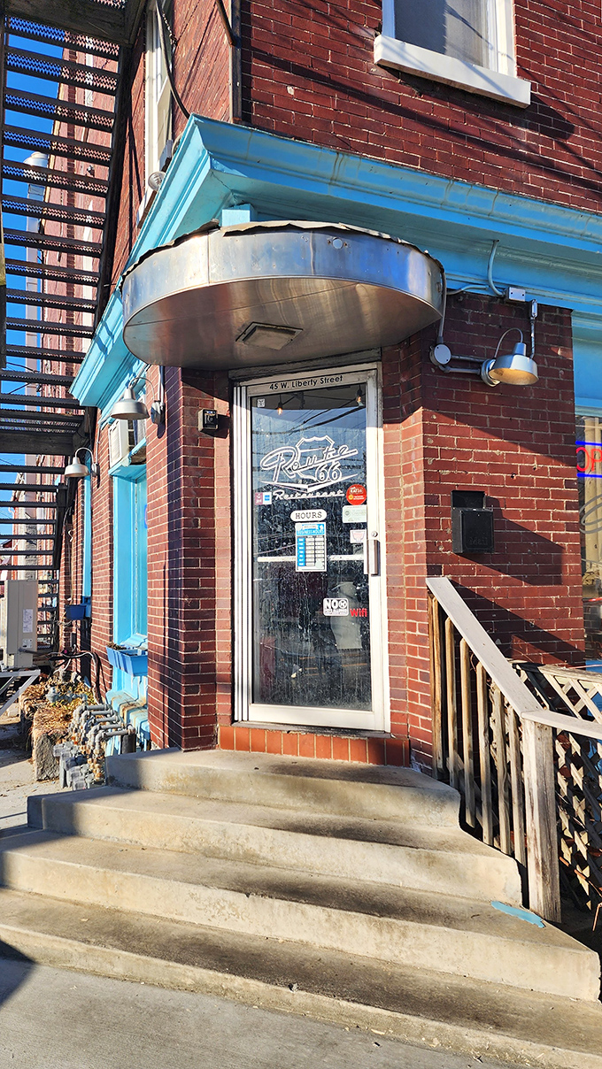 The brick exterior with turquoise trim isn't trying to impress anyone—it's too busy housing some of Lancaster's most crave-worthy cheesesteaks instead.