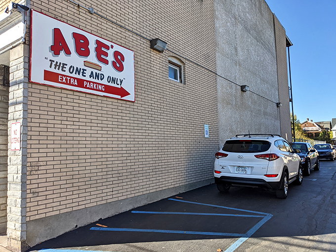 The classic American storefront that time forgot&mdash;complete with vintage sign, American flag, and the promise of comfort food that delivers on nostalgia.