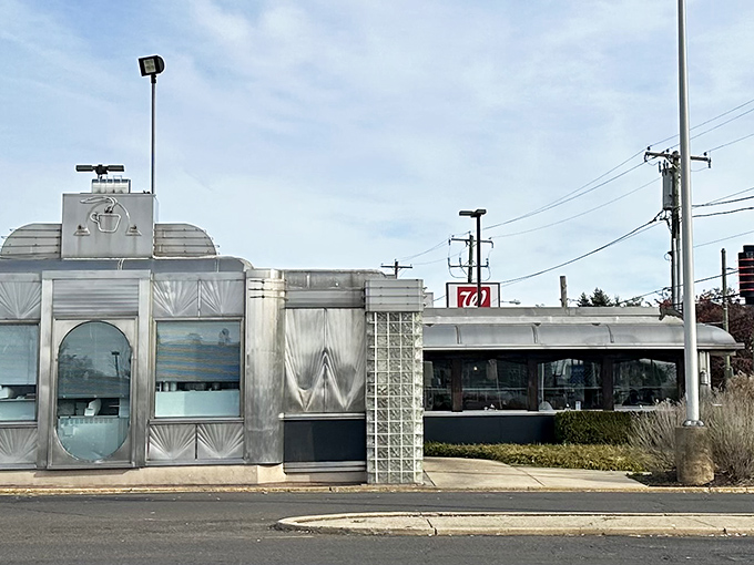 The gleaming Art Deco exterior of The Dining Car stands like a time capsule on Frankford Avenue, beckoning hungry Philadelphians with its silver siren song. P