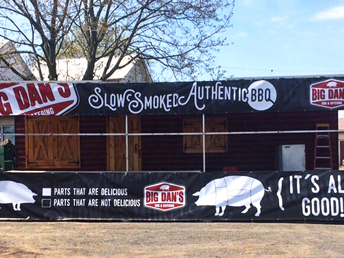 The rustic exterior of Big Dan's BBQ promises smoky treasures within. Red picnic tables invite you to dive into Pennsylvania's answer to Southern barbecue royalty. 