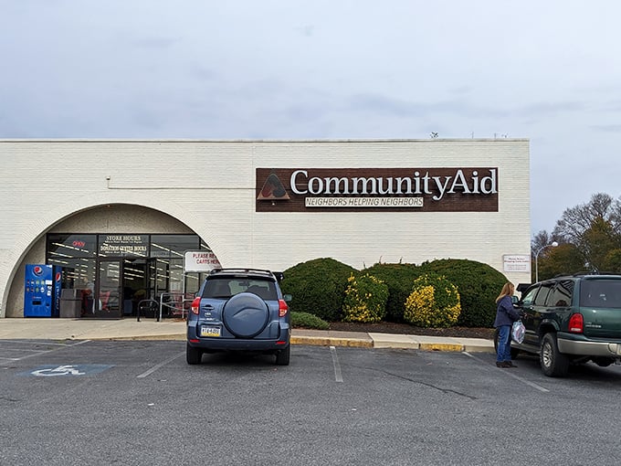 The white brick facade with its distinctive arch isn't just inviting—it's practically a portal to treasure hunting nirvana. "Neighbors Helping Neighbors" isn't just a tagline, it's a promise.