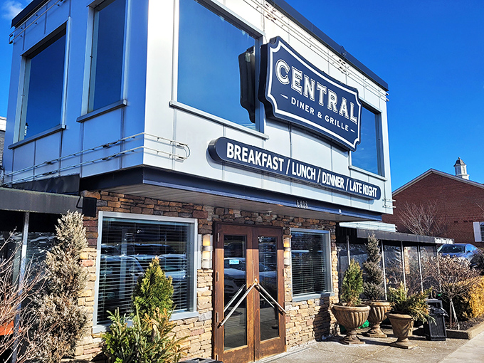 The exterior of Central Diner & Grille stands like a beacon of comfort food promise under Pittsburgh skies. Some buildings just look like they contain happiness.