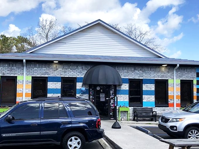 The colorful exterior of Early Bird Diner stands out like a beach umbrella in winter, promising a dining experience as vibrant as its paint job.