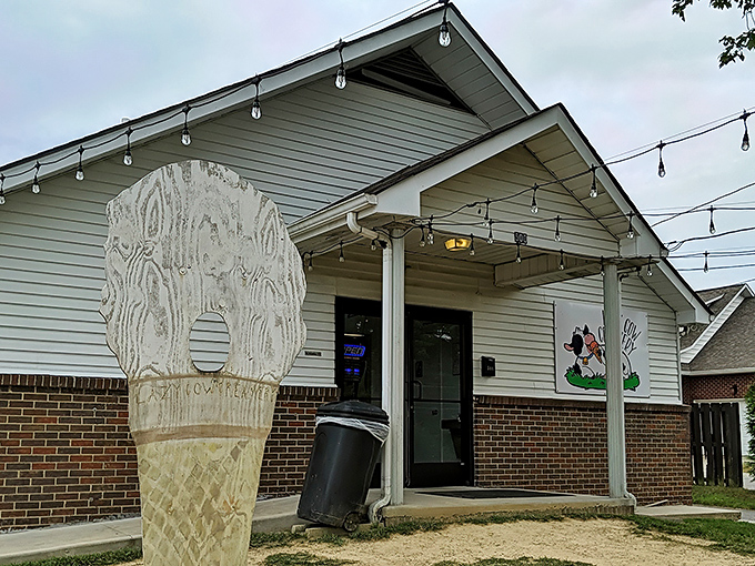 The unassuming white building with string lights and a cow logo promises more joy than most five-star restaurants I've visited.
