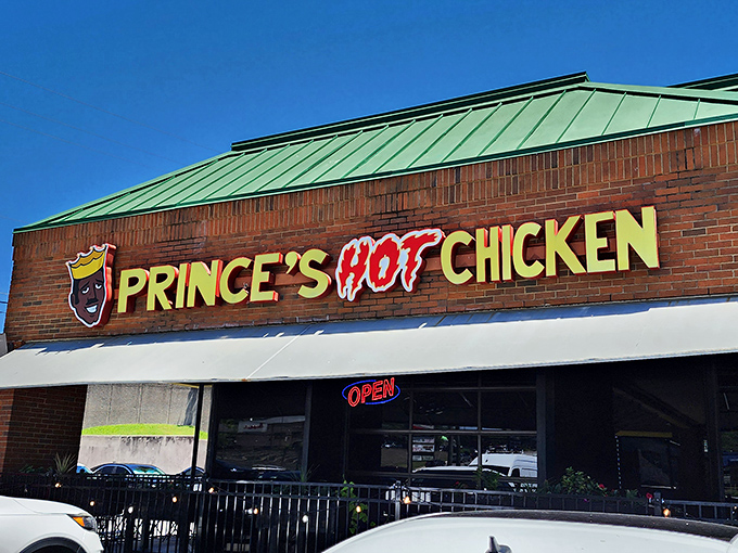 The iconic crowned logo of Prince's Hot Chicken stands like a fiery beacon on Nashville's landscape, promising delicious pain to brave souls.