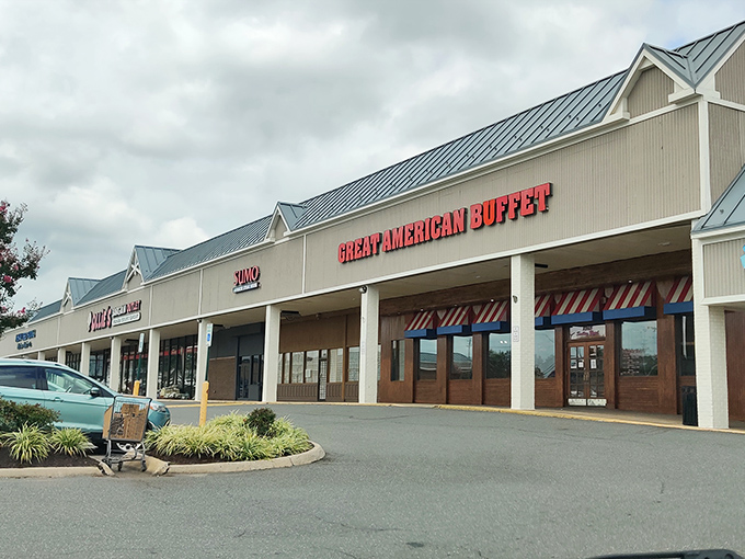 The unassuming strip mall exterior houses culinary treasures that would make fancy restaurants blush. Like finding a Broadway show in your neighbor's garage.