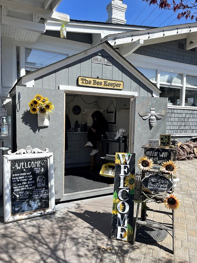 The Bee Keeper entrance welcomes you with sunflowers and rustic charm. Like finding a secret garden where breakfast dreams come true.
