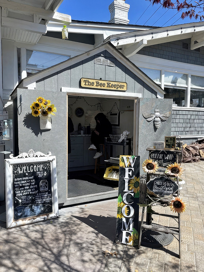 The entrance to The Bee and The Biscuit beckons with sunflower charm and a promise of comfort food that'll make your morning sing.