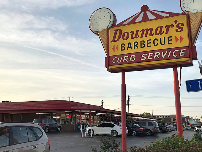 The iconic red-roofed Doumar's stands like a time capsule on the Norfolk corner, its curved architecture a beacon for hungry travelers seeking authentic Americana.
