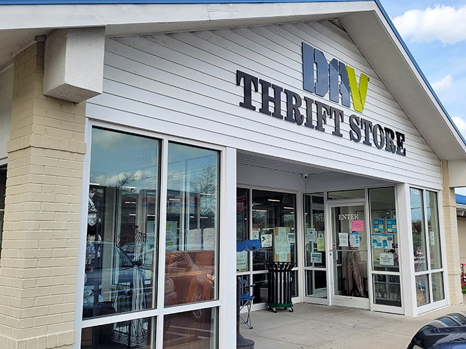The unassuming exterior of DAV Thrift Store stands like a humble guardian of treasures, its simple signage belying the wonderland of bargains waiting inside.