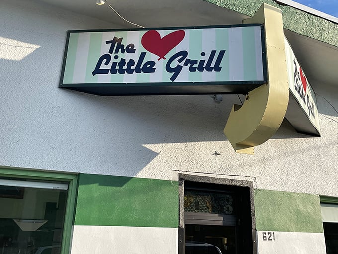 The unassuming exterior of The Little Grill Collective hides culinary treasures that locals have cherished for decades.