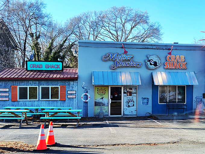 The blue exterior of Mother Shuckers stands out like a coastal mirage in Martinsburg, promising seafood treasures that seem impossible this far from the ocean.