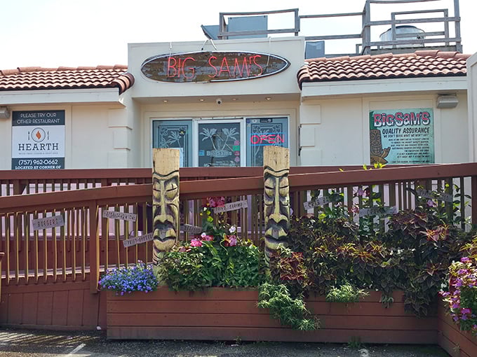 The neon glow of Big Sam's sign against the twilight sky &ndash; like a lighthouse guiding hungry sailors to seafood paradise.