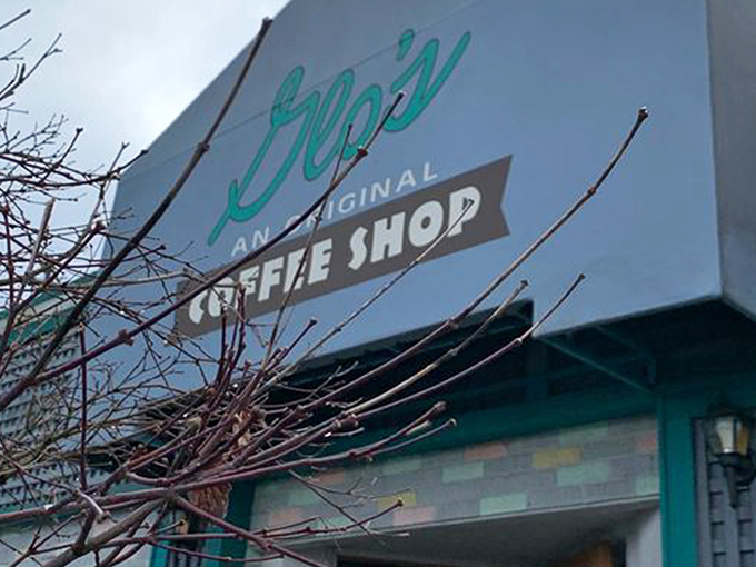 Glo's sleek new digs blend modern architecture with that classic diner charm. The wooden accents and glass frontage say "Yes, we've grown up, but we still remember where we came from."