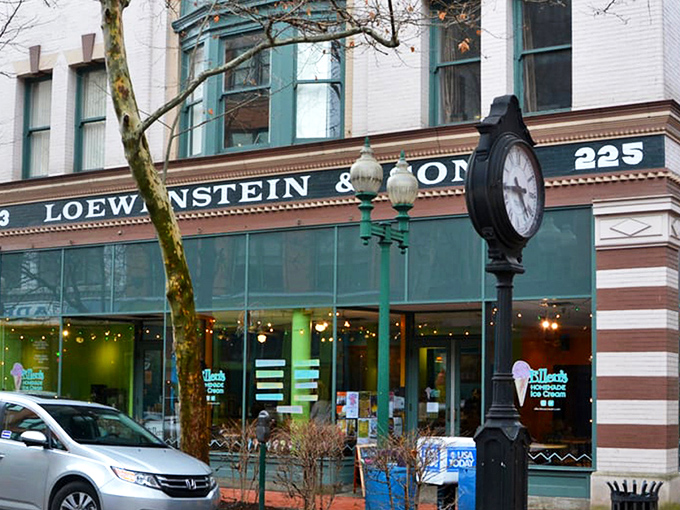 Ellen's vibrant storefront beckons from Capitol Street like a colorful oasis in downtown Charleston. That clock isn't just telling time&mdash;it's counting down to your next ice cream fix.