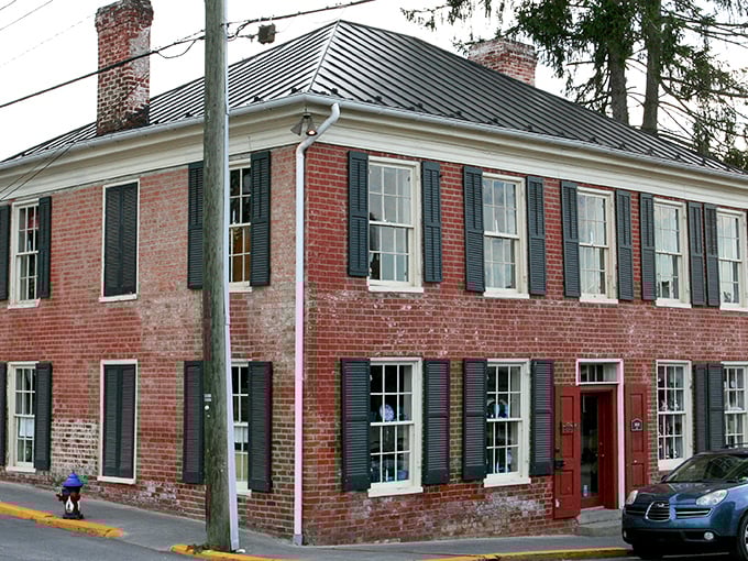 Historic brick buildings line Lewisburg's charming streets, where culinary adventures await behind every beautifully preserved fa&ccedil;ade.