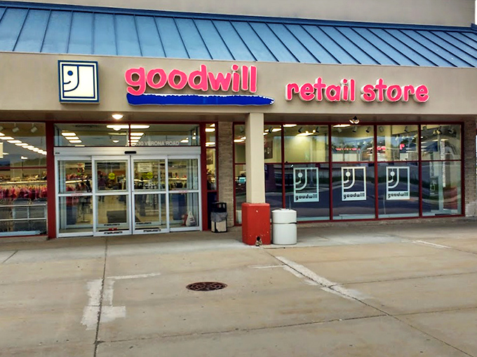 The blue-roofed treasure chest of Madison awaits! Goodwill Nakoma stands like a retail fortress where bargain hunters begin their day-long quests.