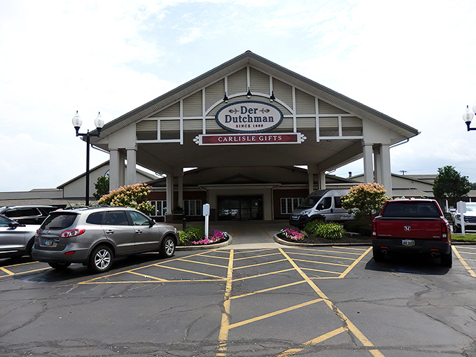 The welcoming facade of Der Dutchman stands like a beacon of comfort food, promising Amish delights that'll make your taste buds do a happy dance.