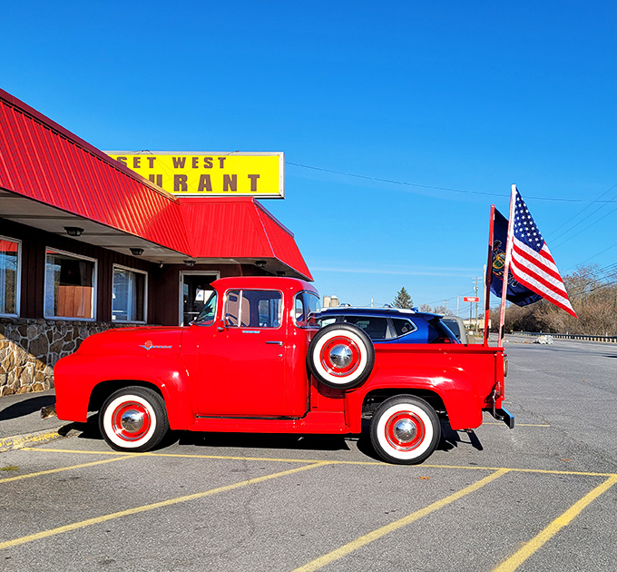 The iconic red roof and stone facade of Sunset West Restaurant stands as a beacon of comfort food in Pleasant Gap, where hungry travelers find their breakfast destiny.