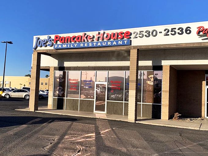 The bright blue and red sign of Joe's Pancake House stands as a beacon of breakfast hope against the clear Arizona sky.