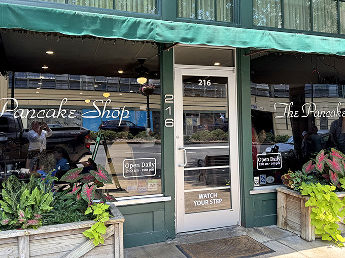 The iconic green sign beckons like a breakfast lighthouse on Central Avenue, promising pancake paradise to early risers and brunch enthusiasts alike.