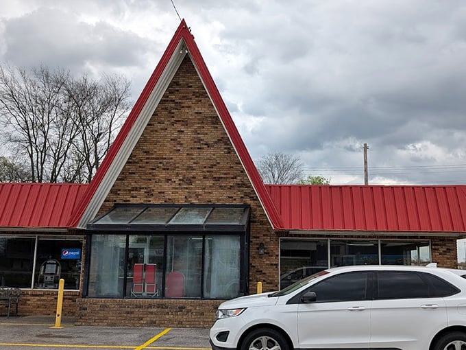 The iconic A-frame roof of G's Pancake House stands like a breakfast beacon, promising comfort food that'll make your morning infinitely better.