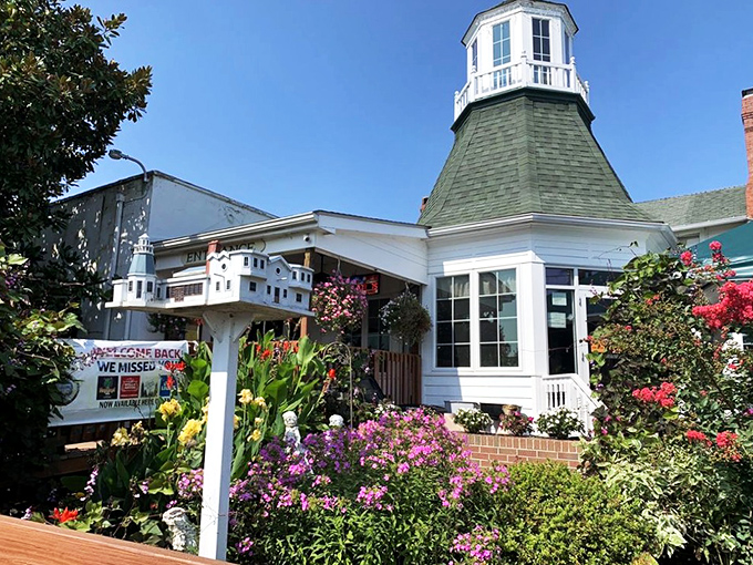 The lighthouse-inspired cupola welcomes diners like a culinary beacon, promising delicious adventures against a backdrop of Maryland's dreamy sunset skies.