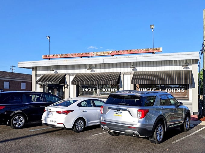 The unassuming exterior of Uncle John's Pancake House&mdash;proof that breakfast greatness often hides behind modest facades. Those black awnings have sheltered hungry Toledoans for generations.