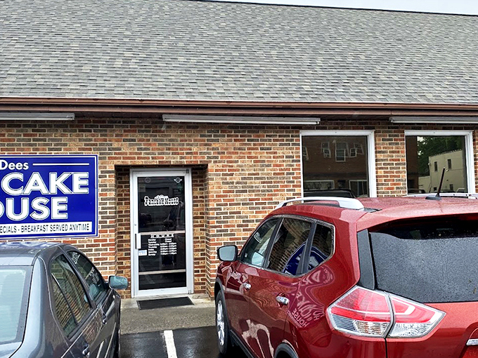 The unassuming brick exterior of L'Dees Pancake House &ndash; where breakfast dreams come true without any architectural showboating. Simple sign, serious pancakes.