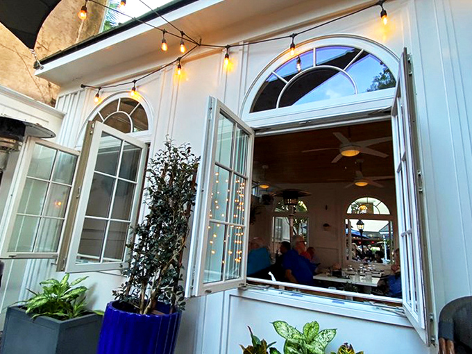 The courtyard at 82 Queen feels like Charleston's best-kept secret&mdash;a lush oasis where palm fronds and wrought-iron chairs conspire to make time slow down deliciously.