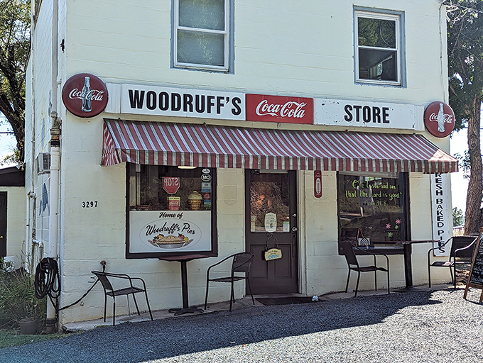 The classic red-and-white striped awning and vintage Coca-Cola signs aren't retro decoration&mdash;they're authentic pieces of Woodruff's history as a former general store.