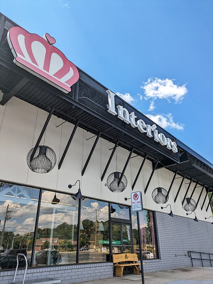 The royal welcome! Queen of Hearts Antiques & Interiors stands proudly in Marietta, its crown logo promising treasure hunters a kingdom of vintage delights inside.